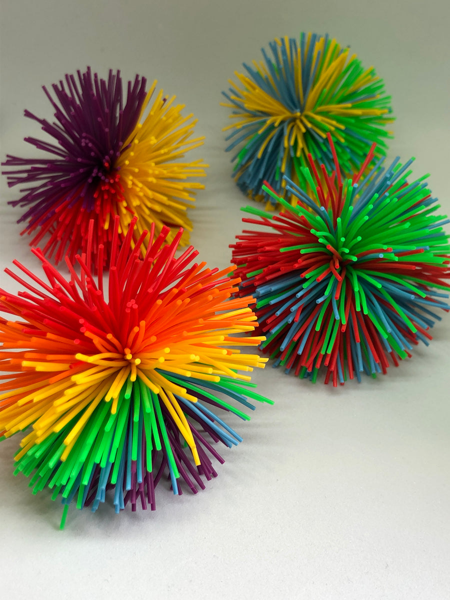 Monkey String Pom Pom Ball – Shelley's Sensory Shop